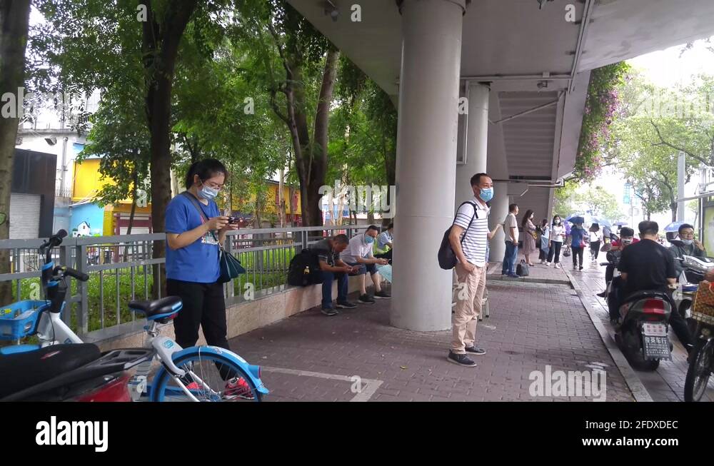 Waiting for bus rain Stock Videos & Footage - HD and 4K Video Clips - Alamy