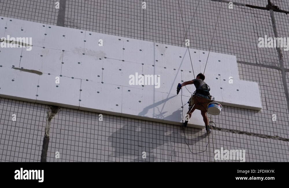 Industrial Climber Insulation of Facade Old High-Rise Building Using ...