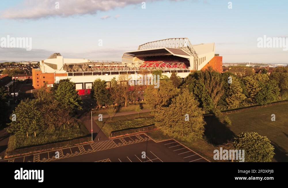 Iconic Anfield Liverpool football club stadium at sunrise aerial view ...