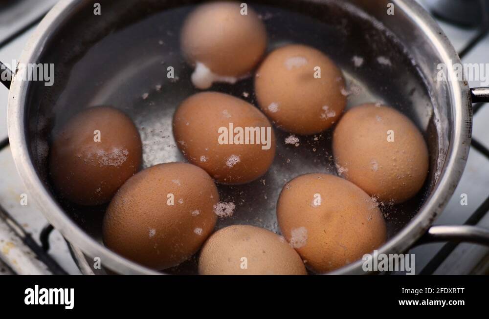 Raw cooked eggs Stock Videos & Footage - HD and 4K Video Clips - Alamy