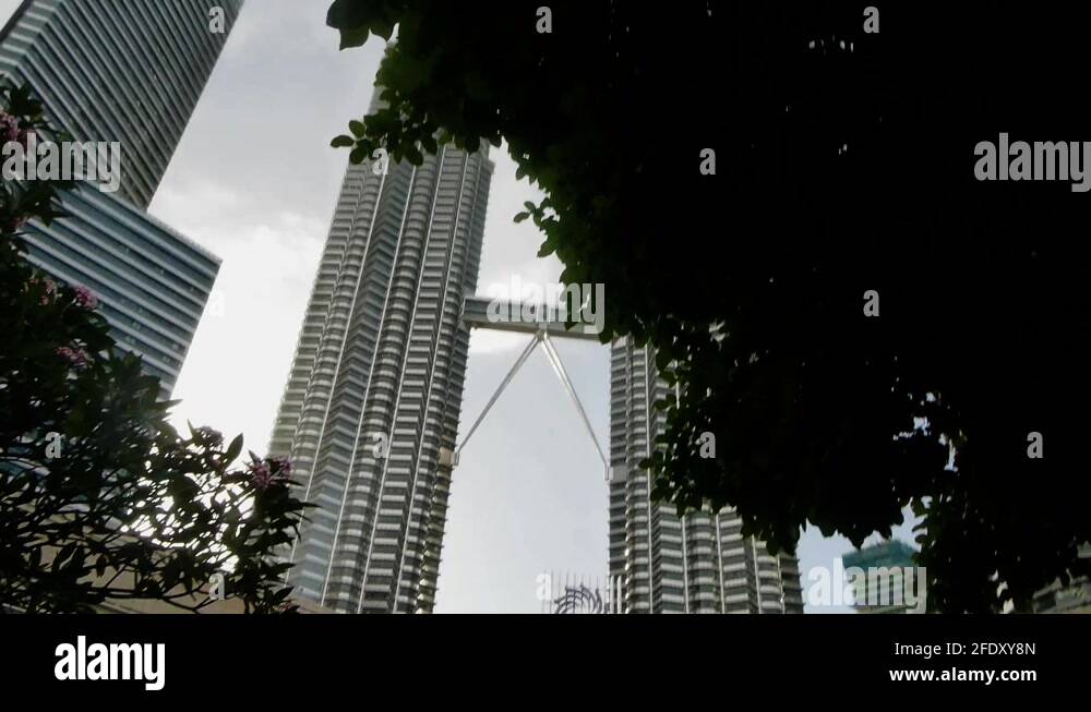 A tall skyscrapper of klcc tower - dolly forward Stock Video Footage ...