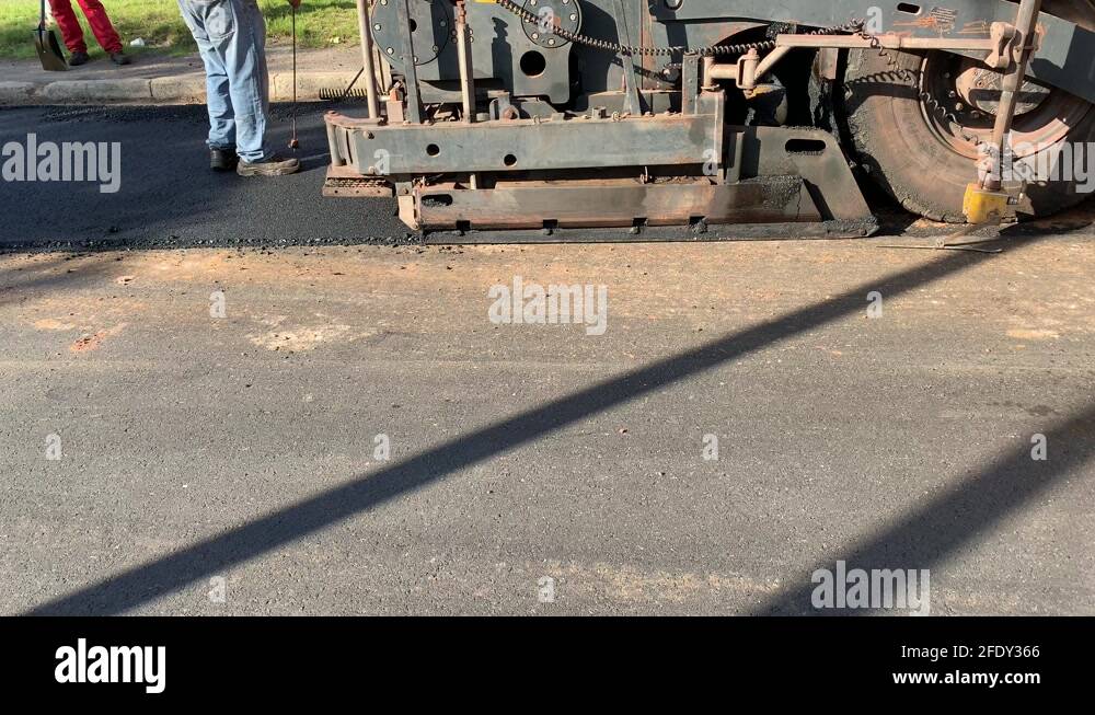 Laying tar Stock Videos & Footage - HD and 4K Video Clips - Alamy