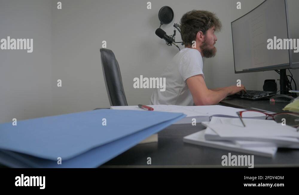 Man with messy desk Stock Videos & Footage - HD and 4K Video Clips - Alamy