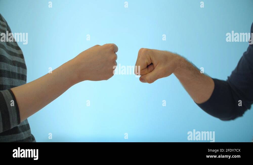 Doing fist bump Stock Videos & Footage - HD and 4K Video Clips - Alamy
