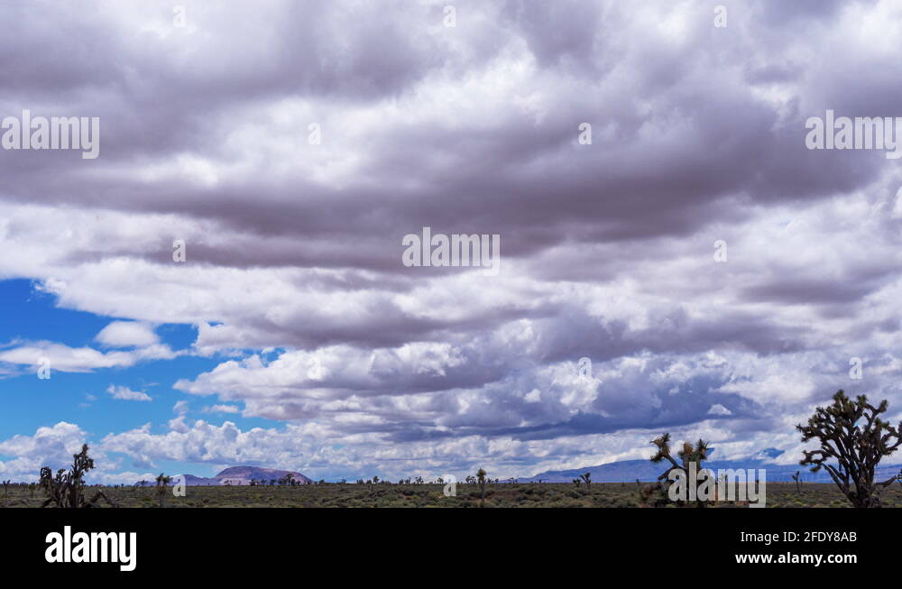 Beautiful White Clouds And Blue Sky Over The Desert In California, USA ...