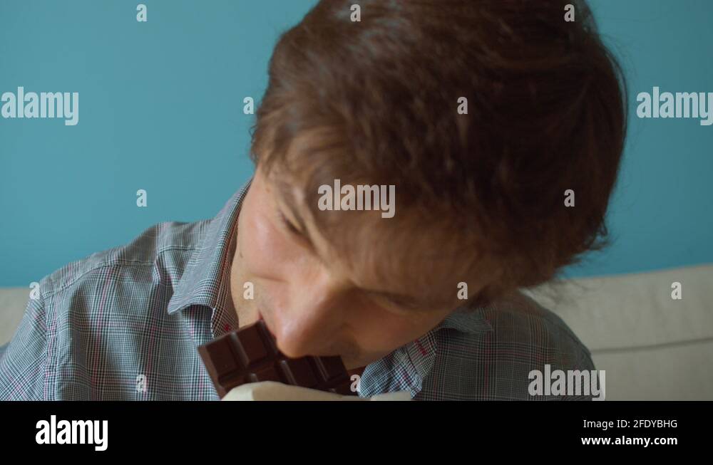 Man eating chocolate Stock Videos & Footage - HD and 4K Video Clips - Alamy