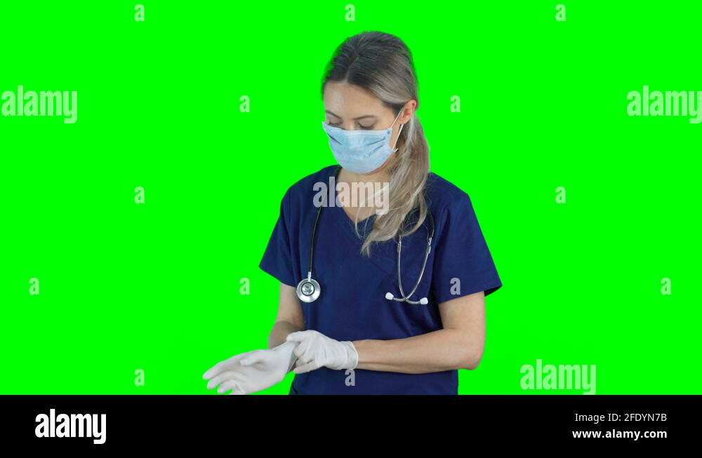 4k Female Nurse Doctor On Green Screen Isolated With Chroma Key Putting