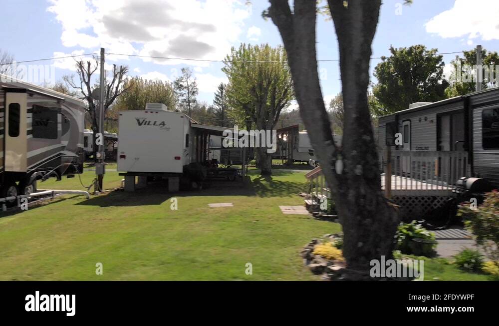 Eye level view of RV campground of fifth wheels, motorhomes and park ...