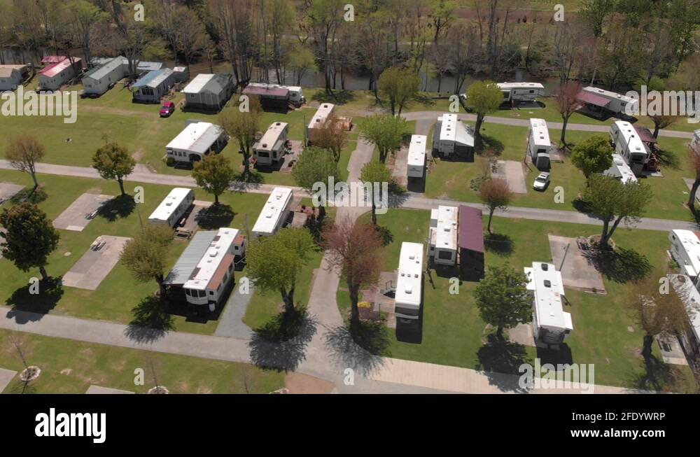Overhead view above campground, river, RV, fifth wheels, motorhomes and ...