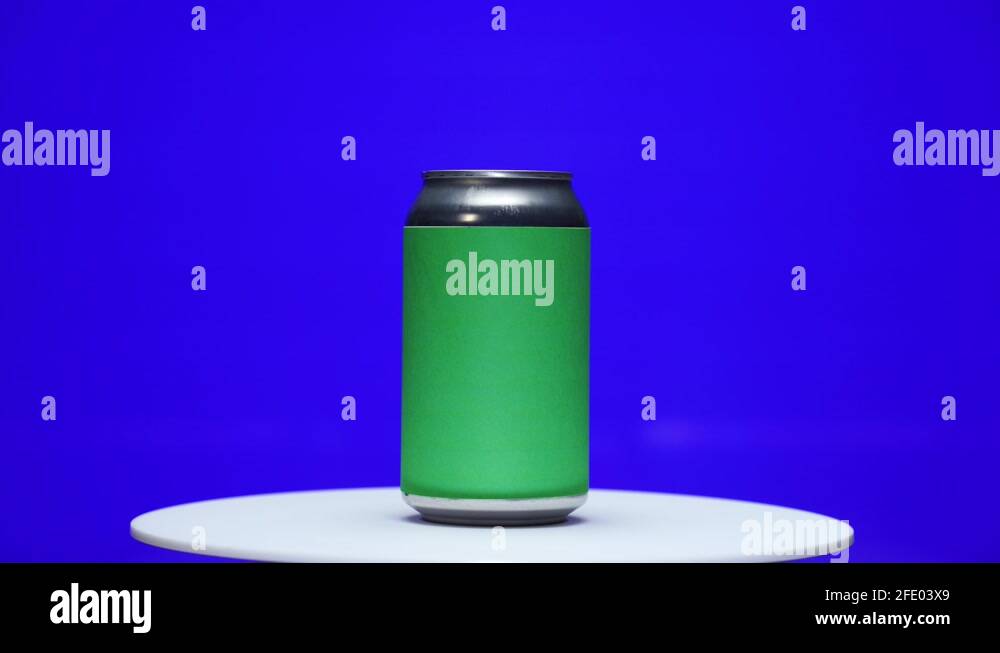 Soda or beer can with chroma green screen label spinning on turntable ...