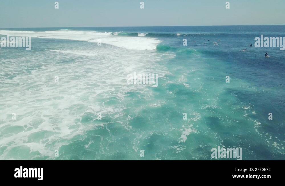 Surfer riding and turning with spray on powerful ocean wave Stock Video ...