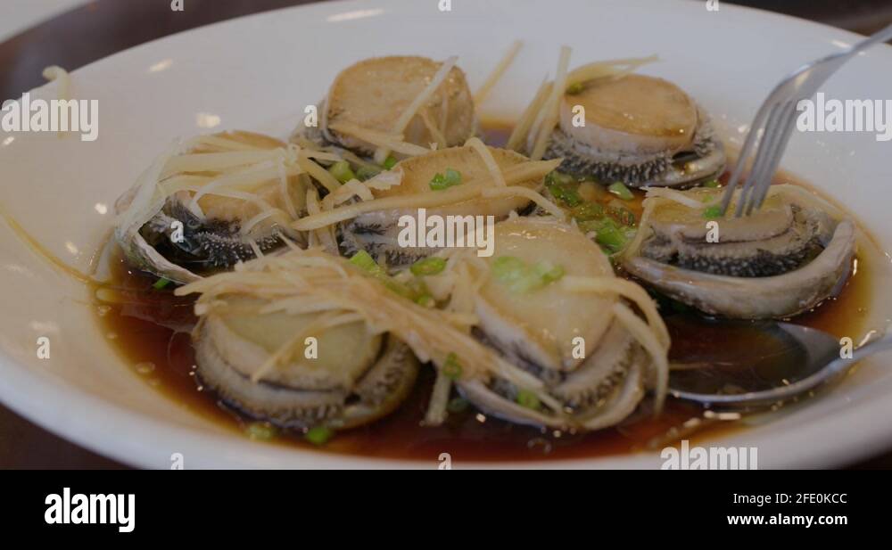 Steamed abalone in the chinese restaurant Stock Video Footage - Alamy