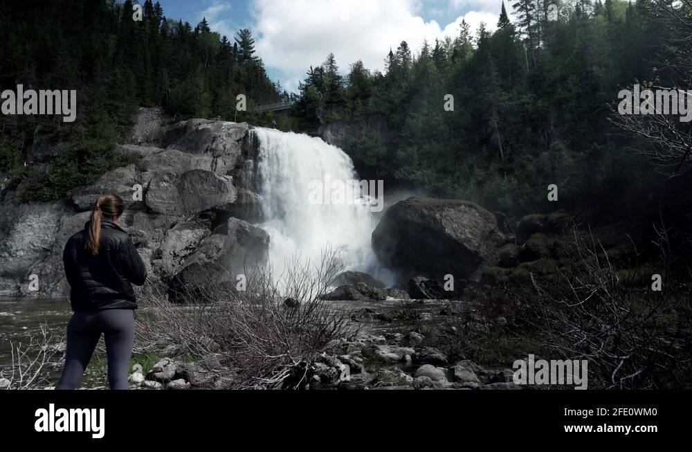 Back View Of A Female Tourist Standing In Front Of Chute Neigette Stock ...