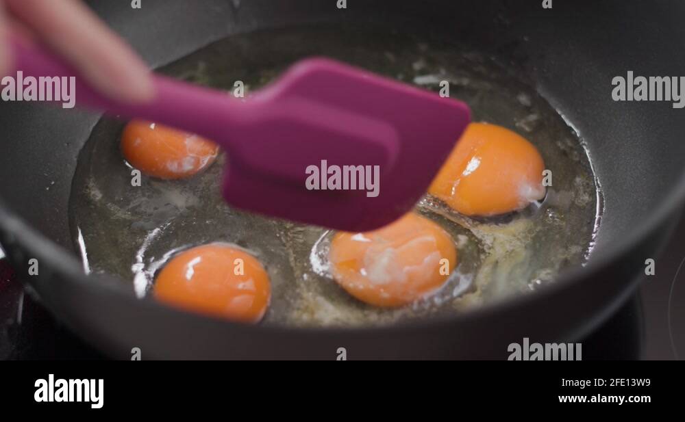Egg crack pan Stock Videos & Footage - HD and 4K Video Clips - Alamy