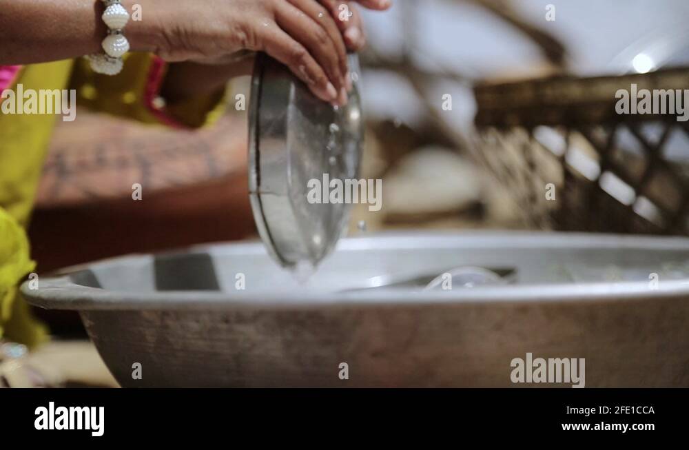 Indian girl washing Stock Videos & Footage - HD and 4K Video Clips - Alamy