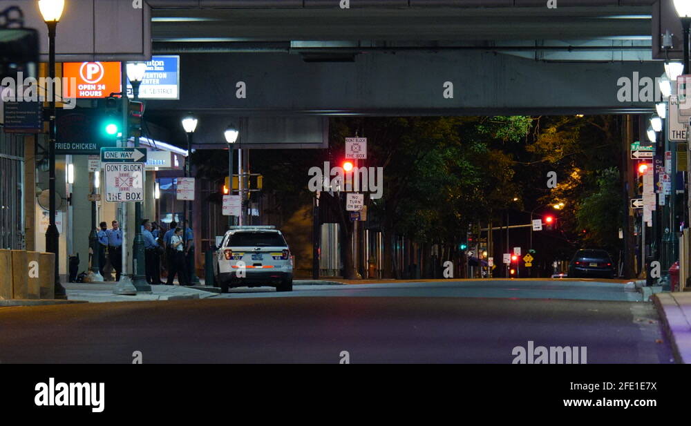 4K LONG SHOT POLICE OFFICERS AND SEPTA BUS UNDERNEATH BRIDGE Stock ...