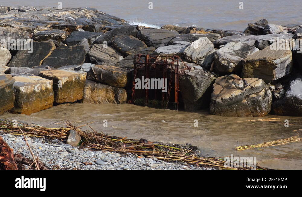 Sewer in the sea. Dirty water pollution. Ecology environment liquid ...