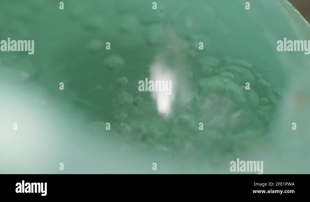 Water dripping into a green bucket in slow motion Stock Video Footage ...