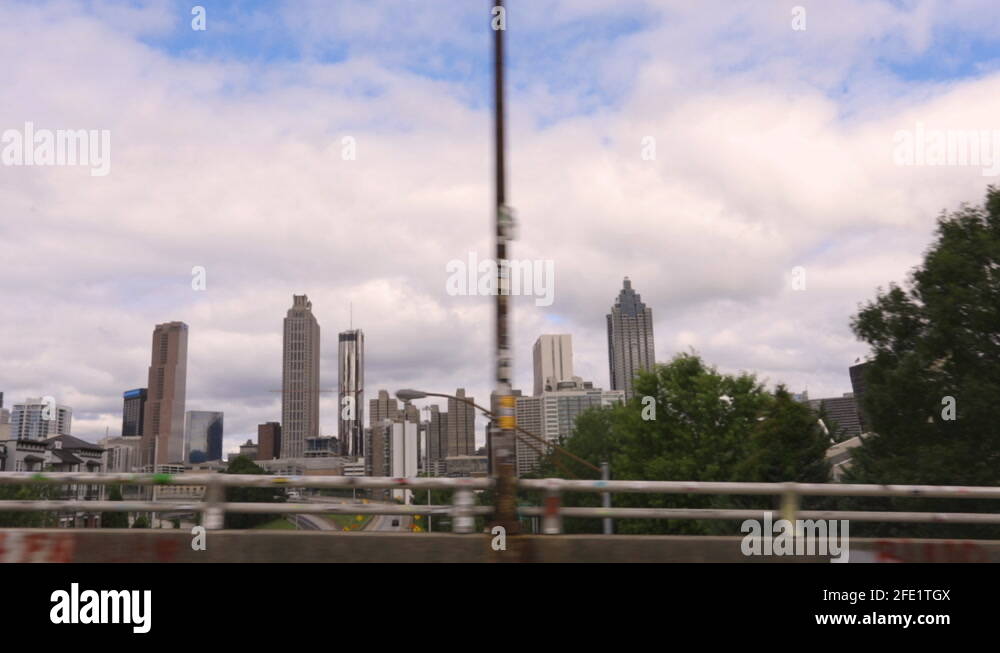 pan of iconic Atlanta skyline from Jackson Street bridge Stock Video ...