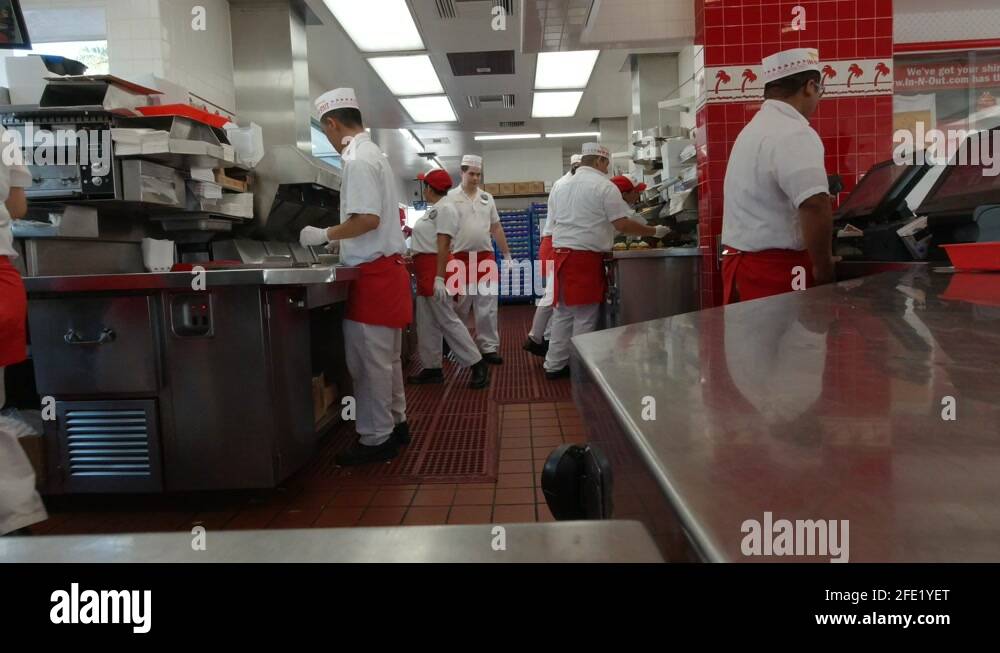 Employees working at In N Out Burger Stock Video Footage - Alamy