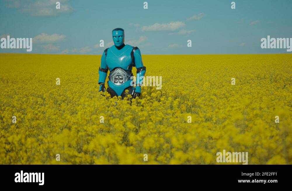 Funny cyborg humanoid performing a comical funky robot dance on flower ...