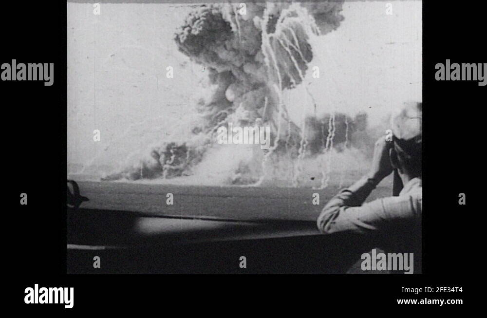 1940s: Men on Coast Guard boat watch gigantic explosion in water ...