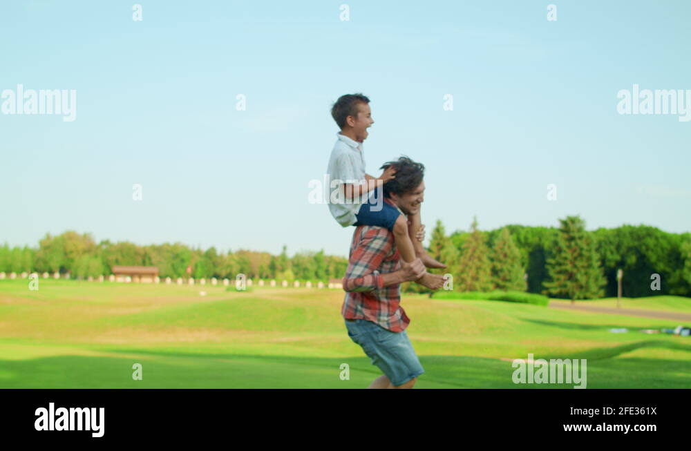 Woman riding on shoulders man Stock Videos & Footage - HD and 4K Video ...