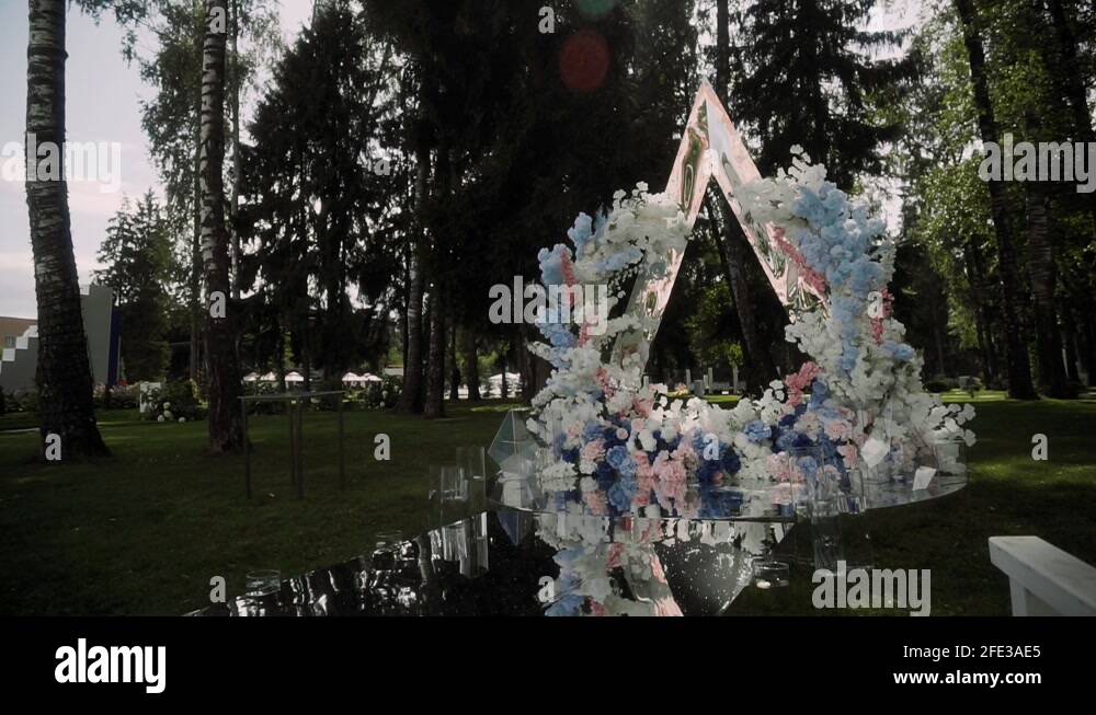 triangular arch for registration. White benches stand in two rows Stock ...