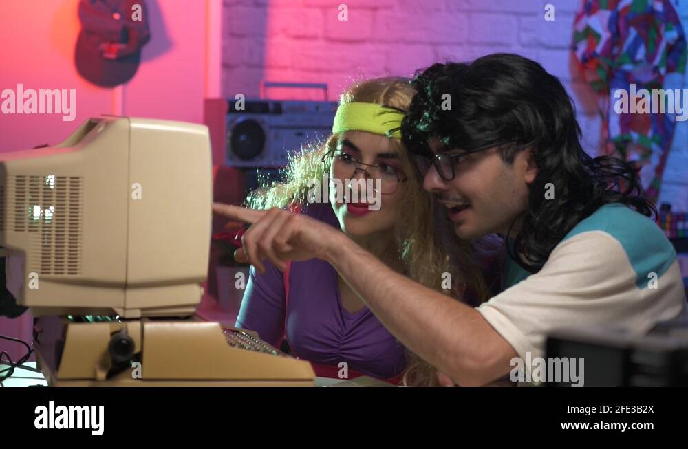 Retro Scene Boy and Girl Using a Computer For the First Time 80s ...