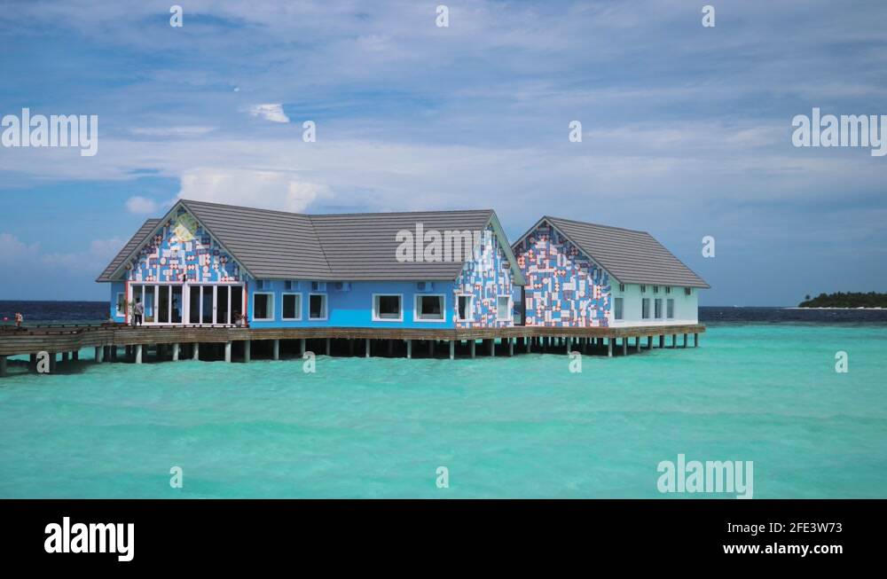 Large structure built on coral reef atoll on stilts in The Maldives ...