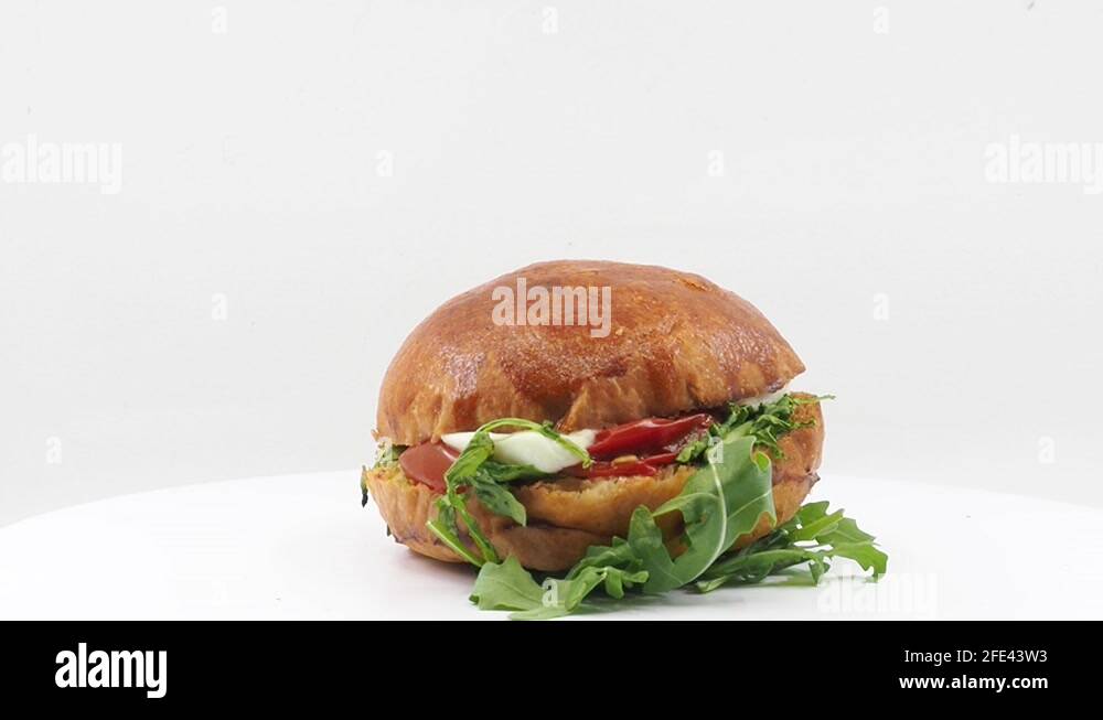 A Rotating Cheese Burger Isolated On A White Background - 4K Stock ...