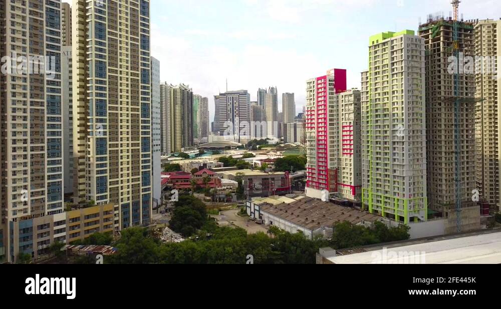 Flying between buildings in the Philippines 4k Stock Video Footage - Alamy