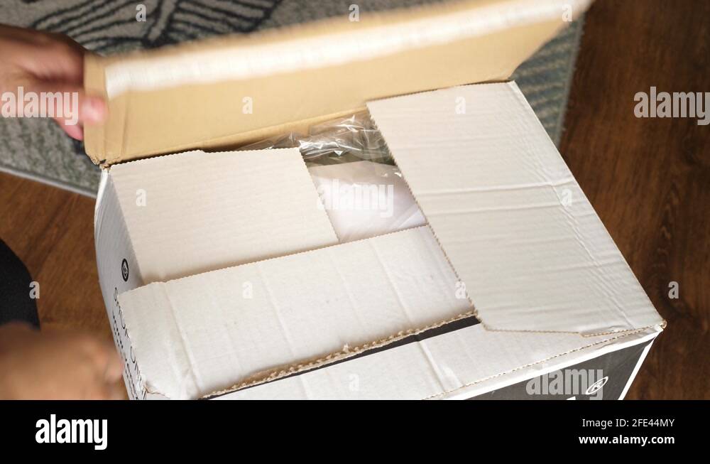Unpacking online order Stock Videos & Footage - HD and 4K Video Clips ...