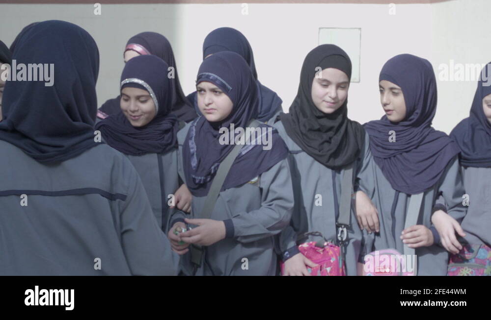 Muslim veiled female students at the school playground Stock Video ...
