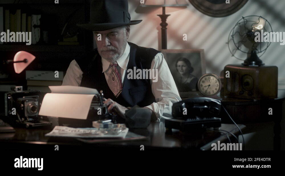 film noir detective typing a report on his typewriter Stock Video ...