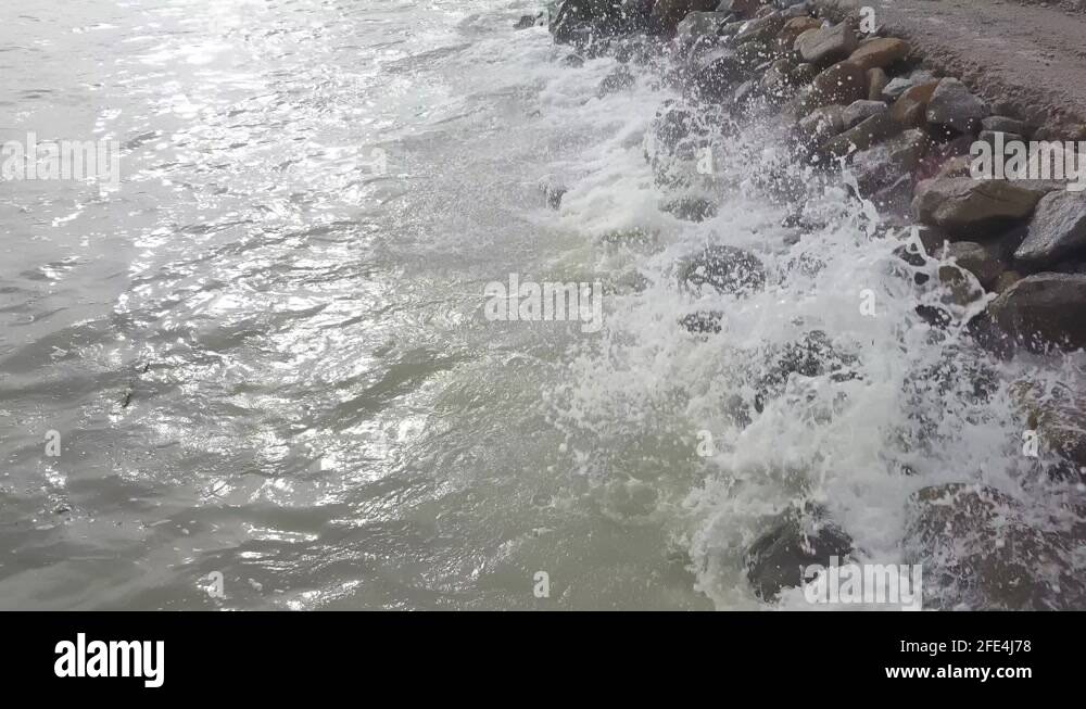 Wave hit the rock Stock Videos & Footage - HD and 4K Video Clips - Alamy