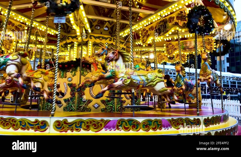 Illuminated Carousel In Front Of Natural History Museum In London Stock ...