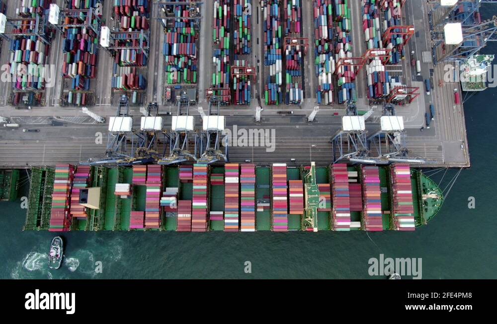 Mega Container Ship docked at Hong Kong port, during loading and unloading Stock Video Footage ...