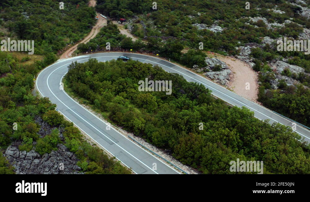 Car going around bend Stock Videos & Footage - HD and 4K Video Clips ...