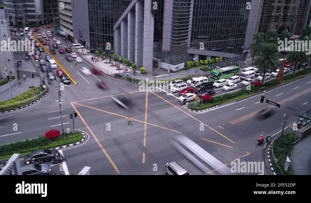 Cars Travelling At The Intersection Of Ayala Avenue In Makati City ...
