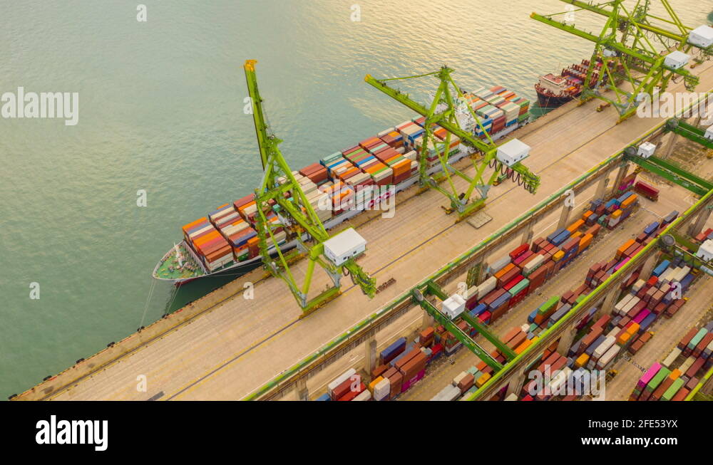 sunset singapore bay container ship landing port aerial topdown ...