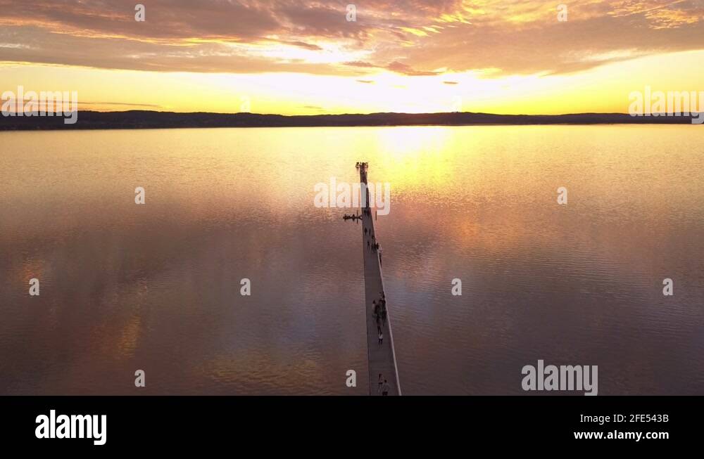 Beautiful aerial of golden sunrise or sunset at Long Jetty Wharf ...