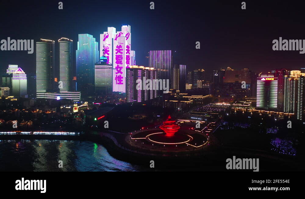 night illumination qingdao city famous bay monument aerial panorama 4k ...