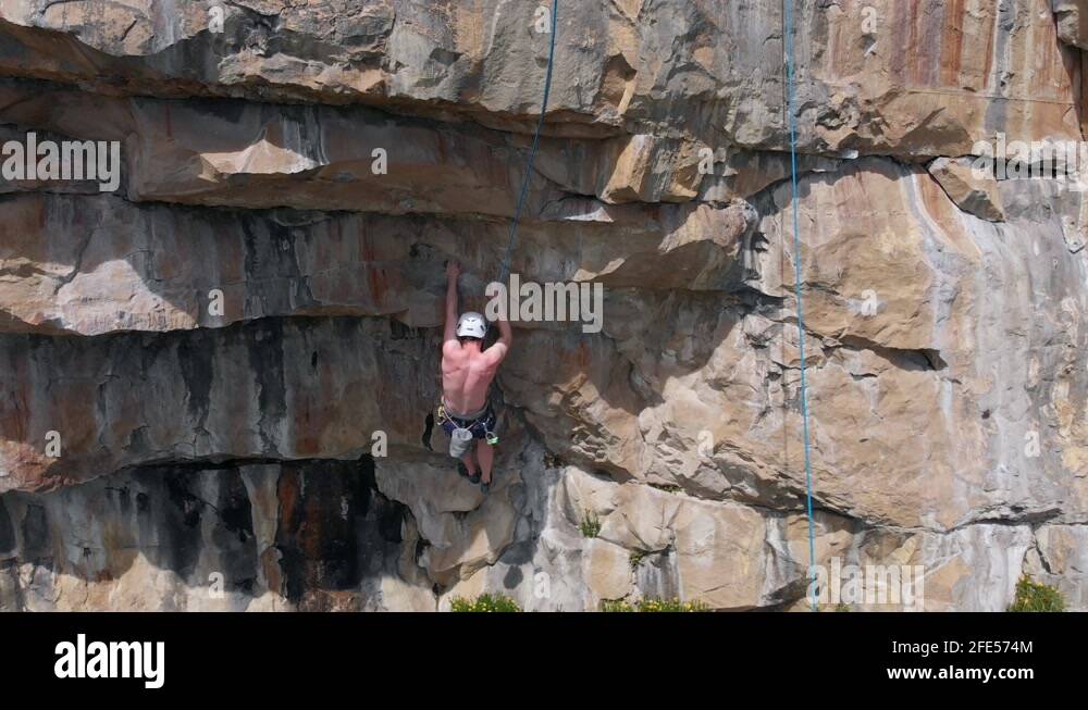 Hanging from ledge Stock Videos & Footage - HD and 4K Video Clips - Alamy
