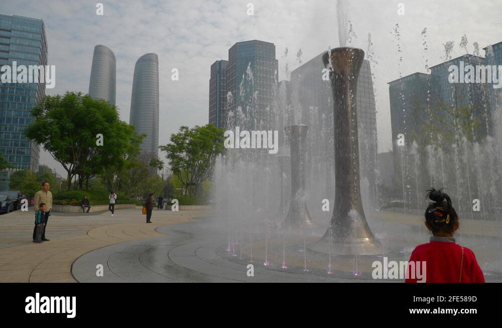 day time chengdu city center famous mall fountain square panorama 4k ...