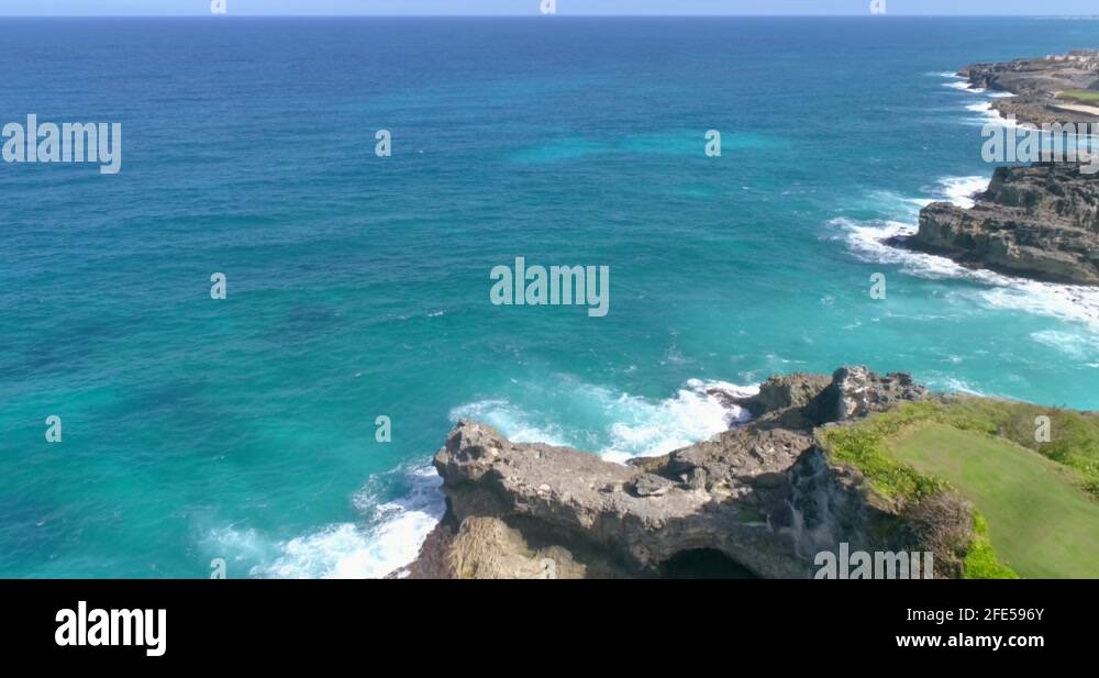 Take Aerea back with a view of the Macao beach cliff and Roco Ki golf ...