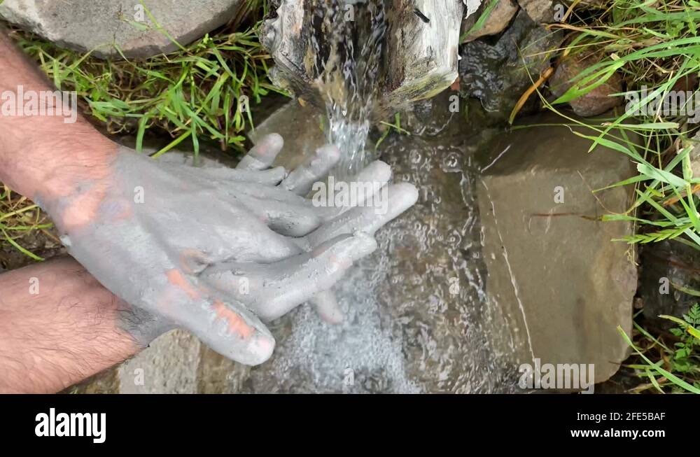 Traditional Clean Washing Hands with Grey Wood Ashes Hand washing Stock ...