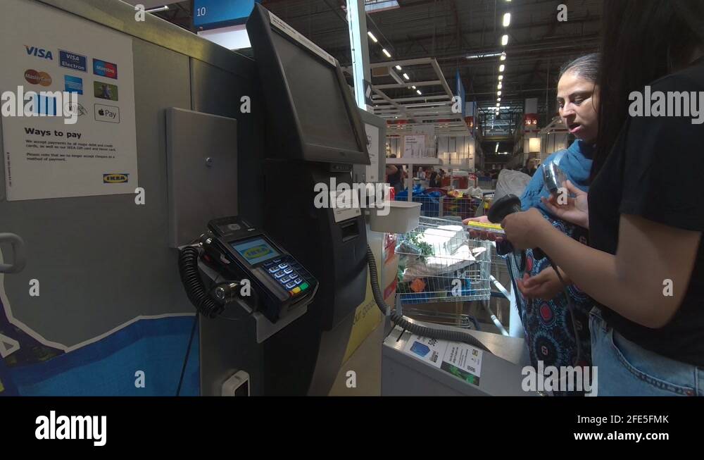 Mother And Daughter Using Self Service Checkout At Ikea In Wembley ...