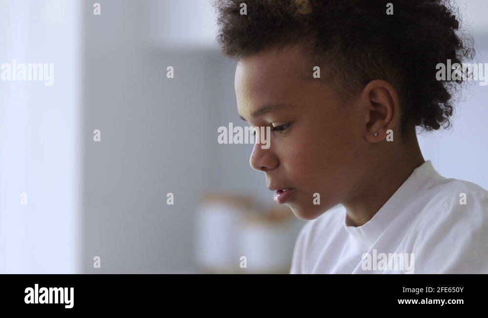 sad boy facial emotion Spbi. portrait of worried nervous mixed race ...