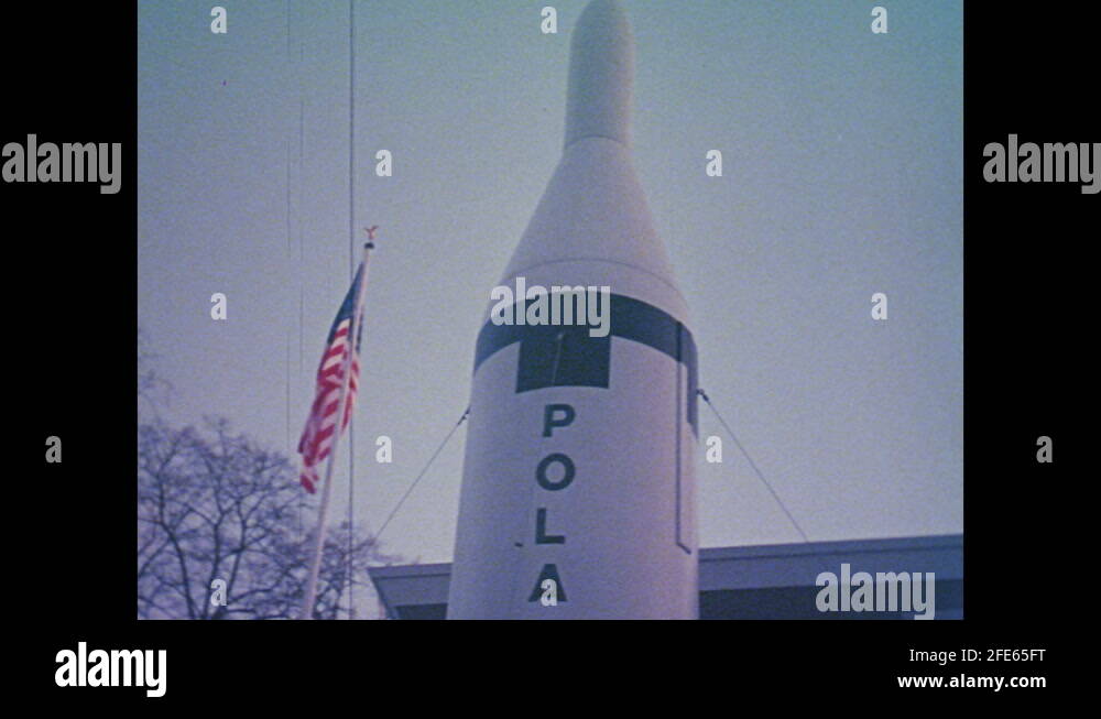 1960s: model of POLARIS Nasa rocket on parade float, truck driving a ...